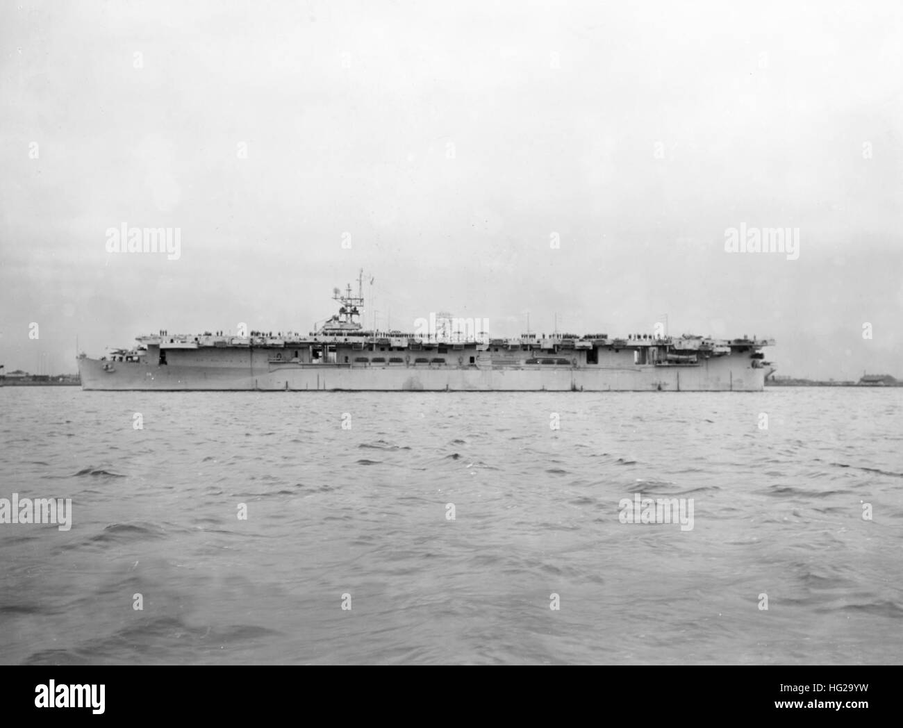 USS Cabot (CVL-28), a light aircraft carrier, is moored off the ...