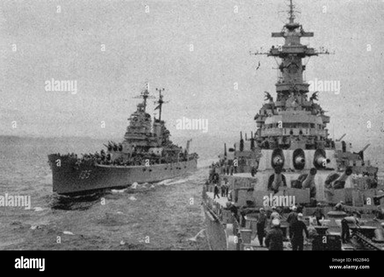 USS Los Angeles (CA-135) alongside USS New Jersey (Bb-62) off Korea in ...