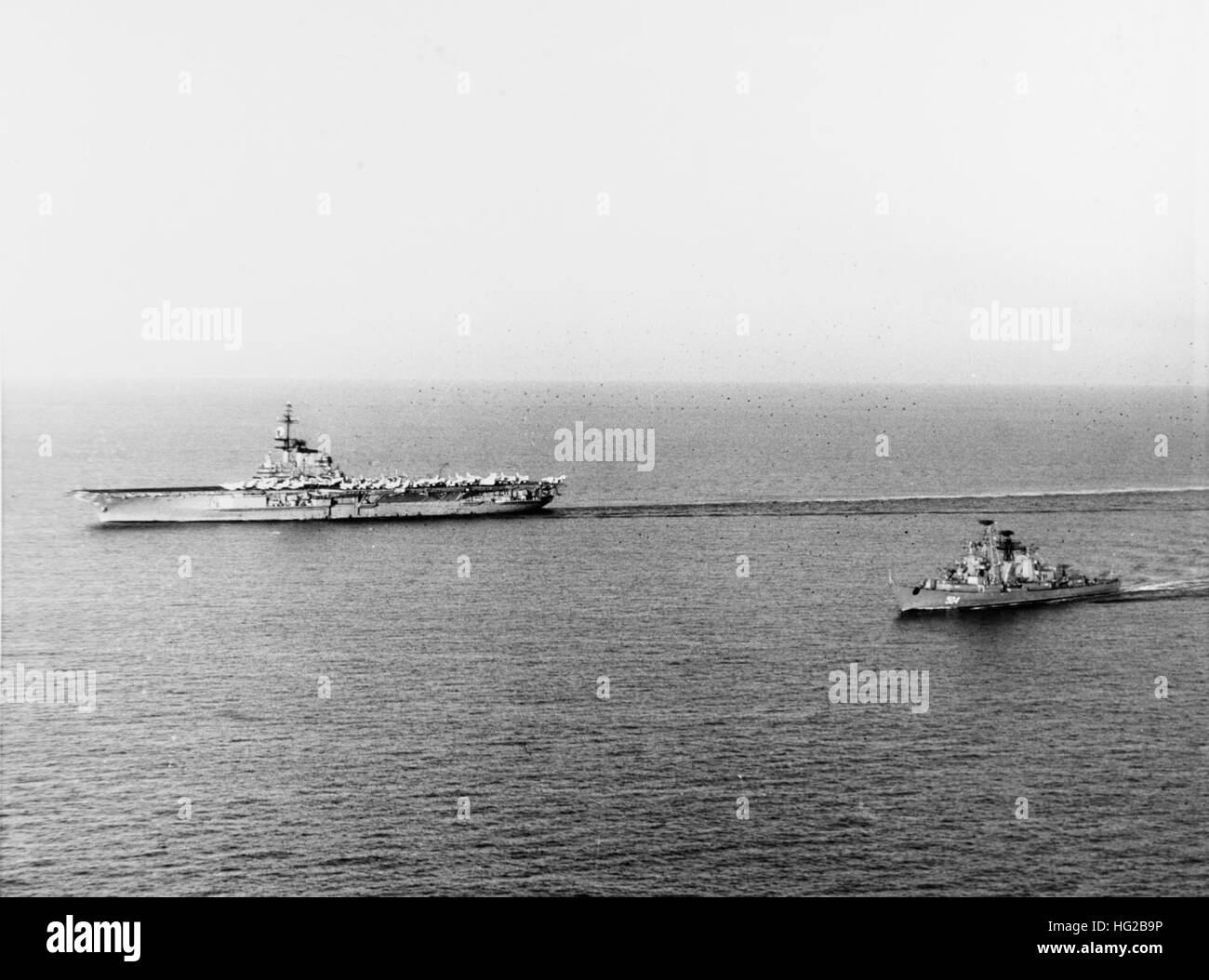 USS Franklin D. Roosevelt (CVA-42) with a Soviet Kashin-class destroyer ...
