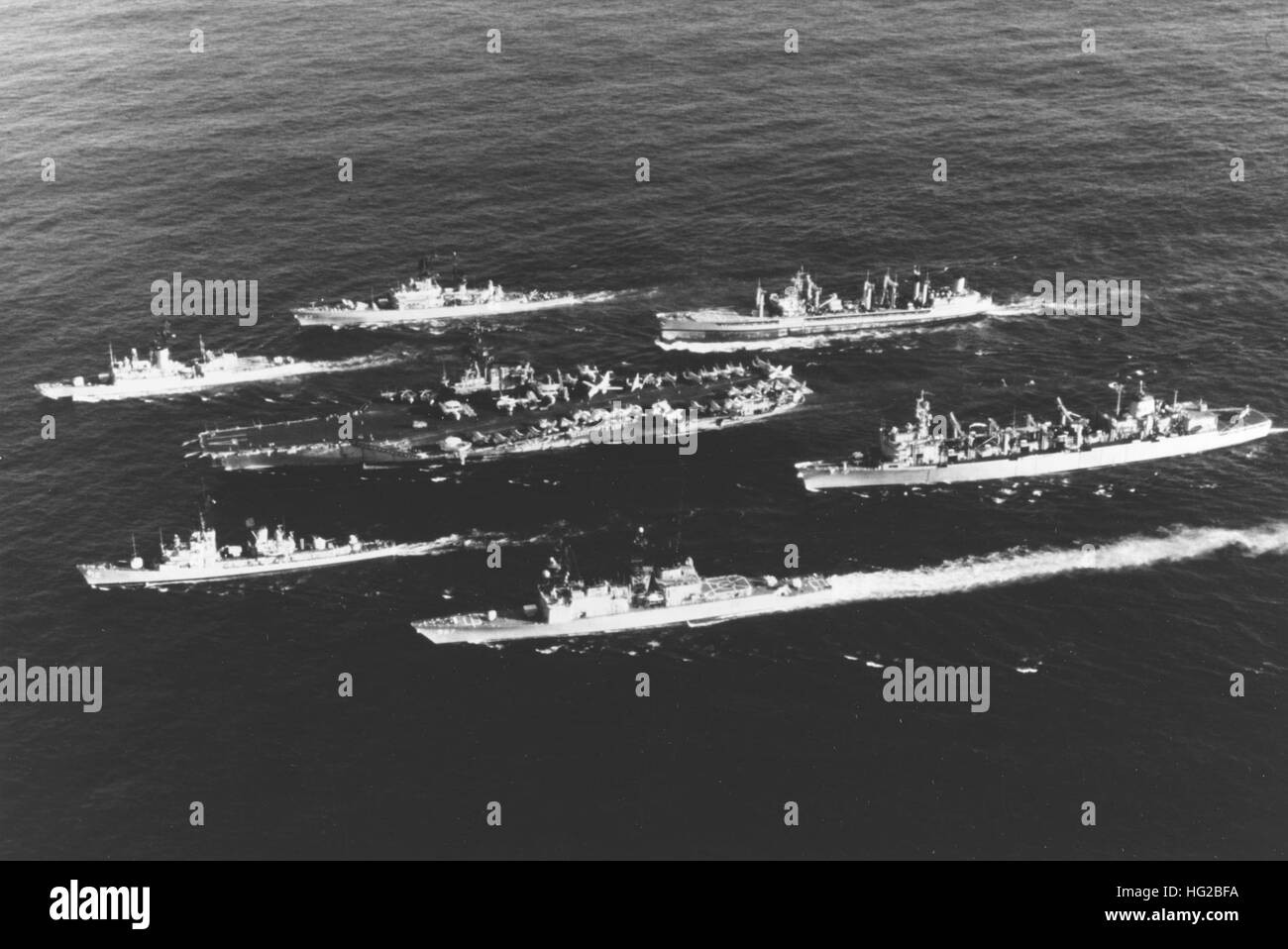 USS Midway (CV-41), an aircraft carrier, leads a battlegroup in the ...