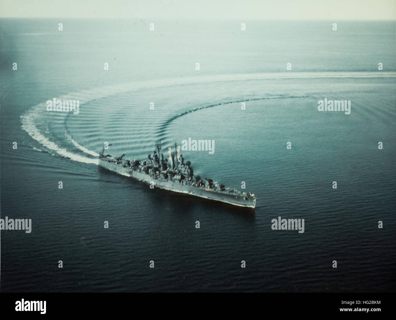 USS Biloxi (CL-80) steams in a turn in October 1943 Stock Photo - Alamy
