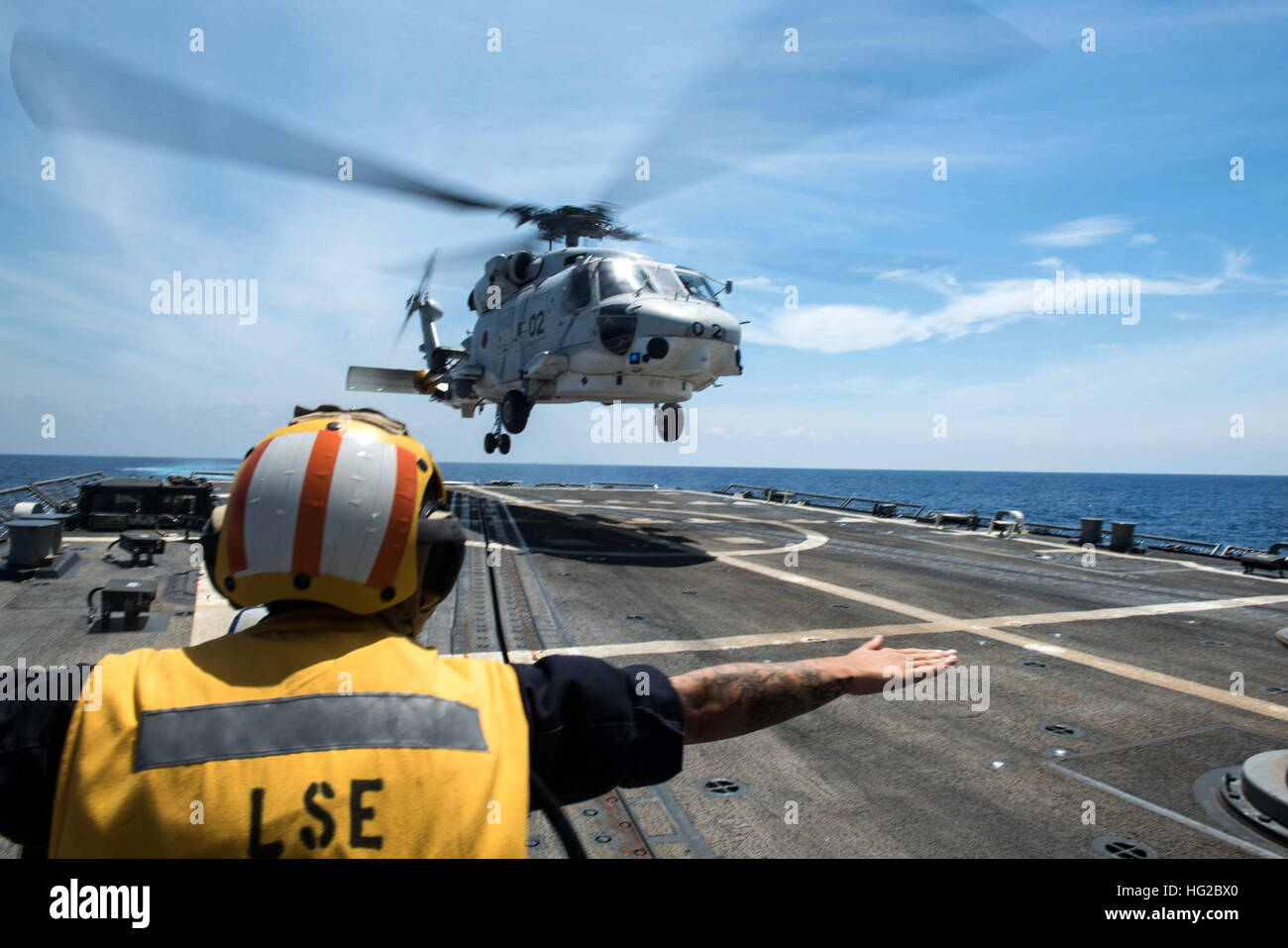 A Japan Maritime Self Defense Force (JMSDF) helicopter, assigned to ...
