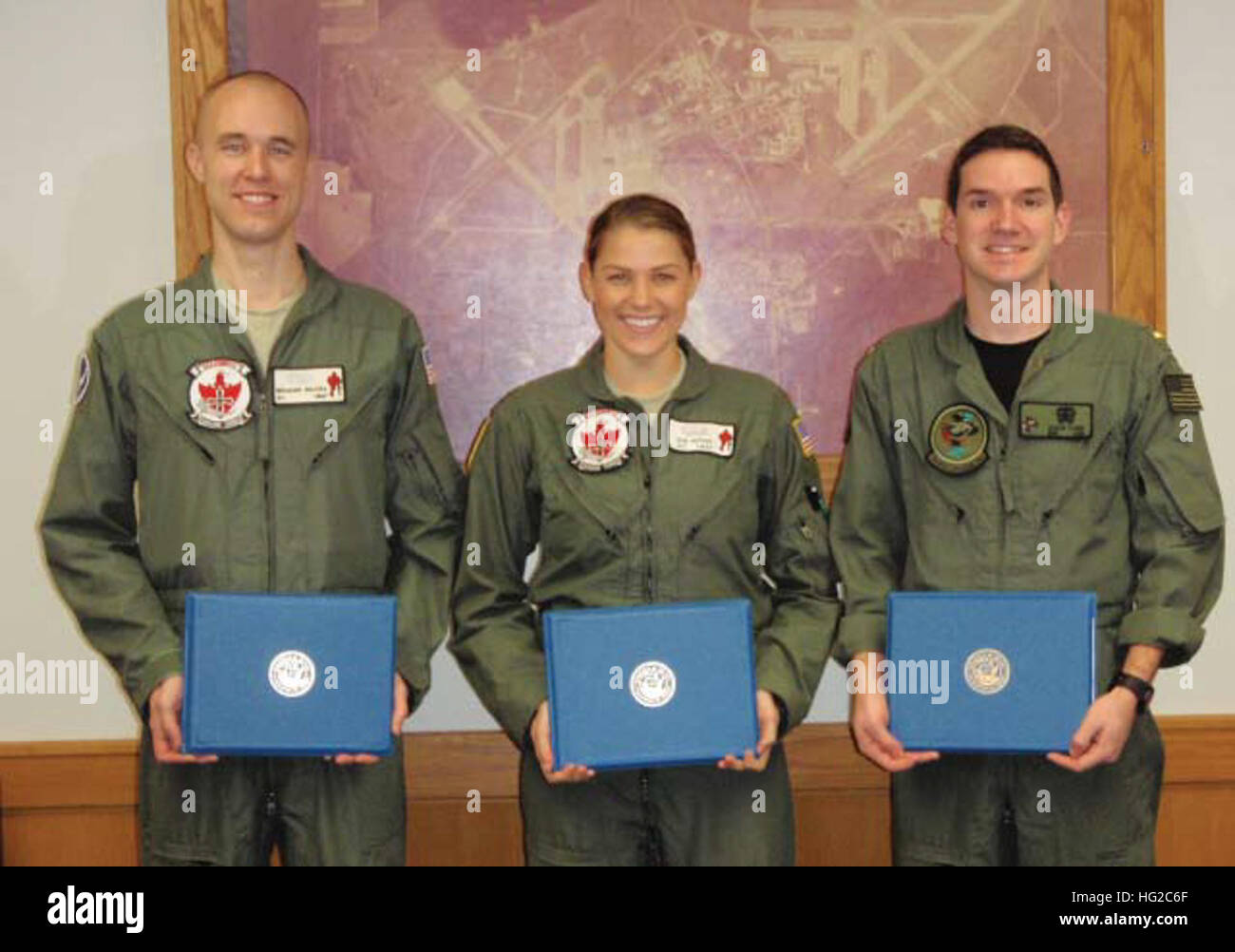 USAF Female F-16 Pilot 2nd Lt. Zoe M. Kotnik hold her academic ...