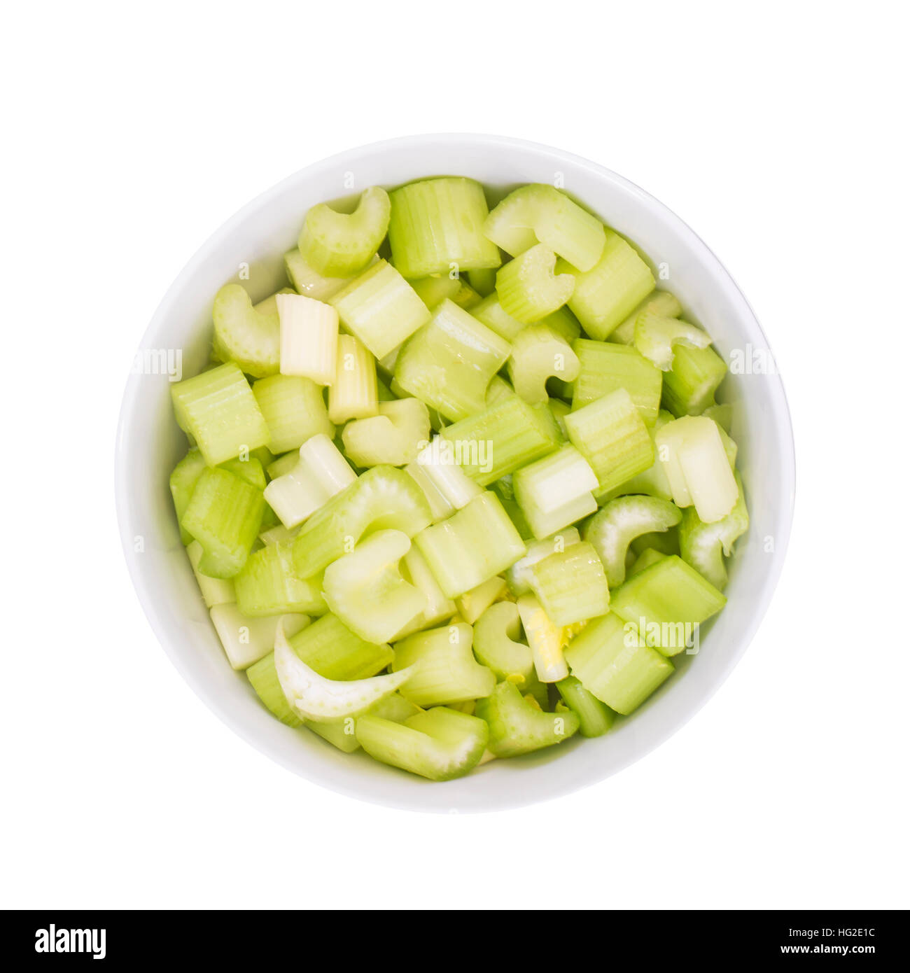 Bowl of fresh celery on a white background Stock Photo - Alamy