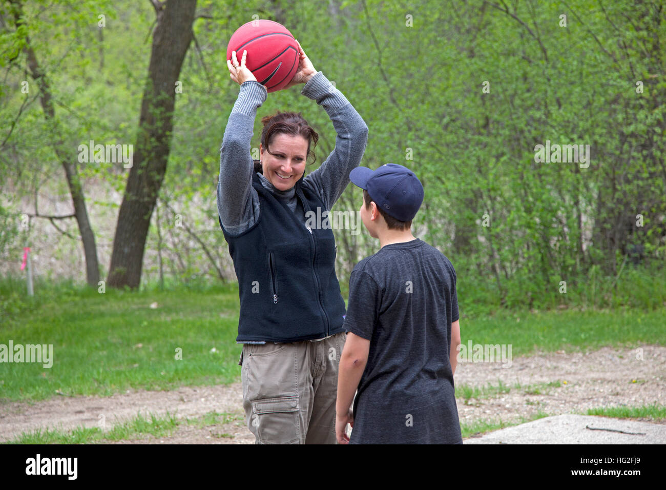Kids Playing Basketball Outside High Resolution Stock Photography and ...