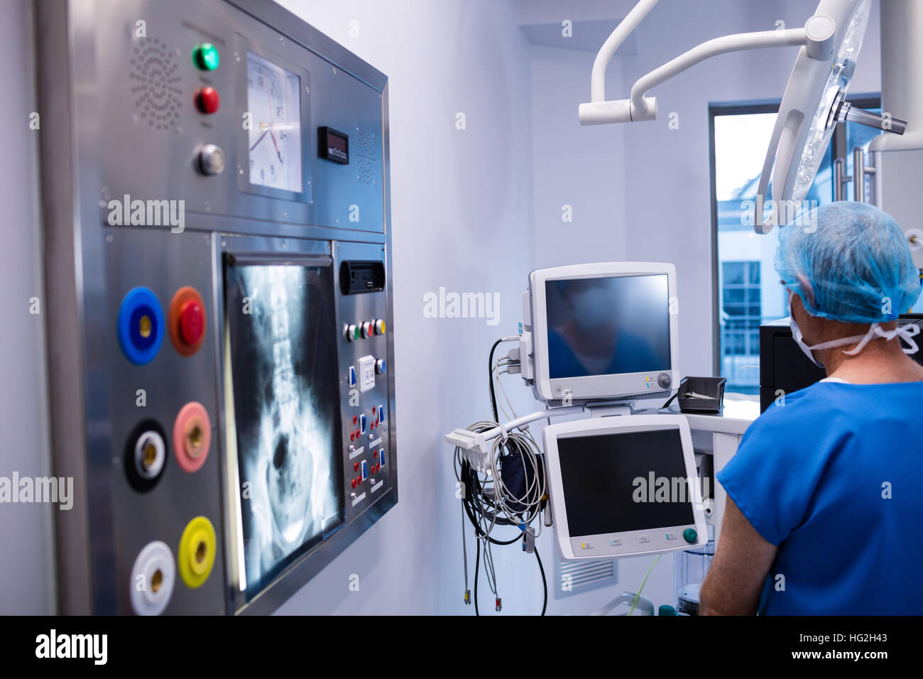Male surgeon working in operation theater of hospital Stock Photo - Alamy