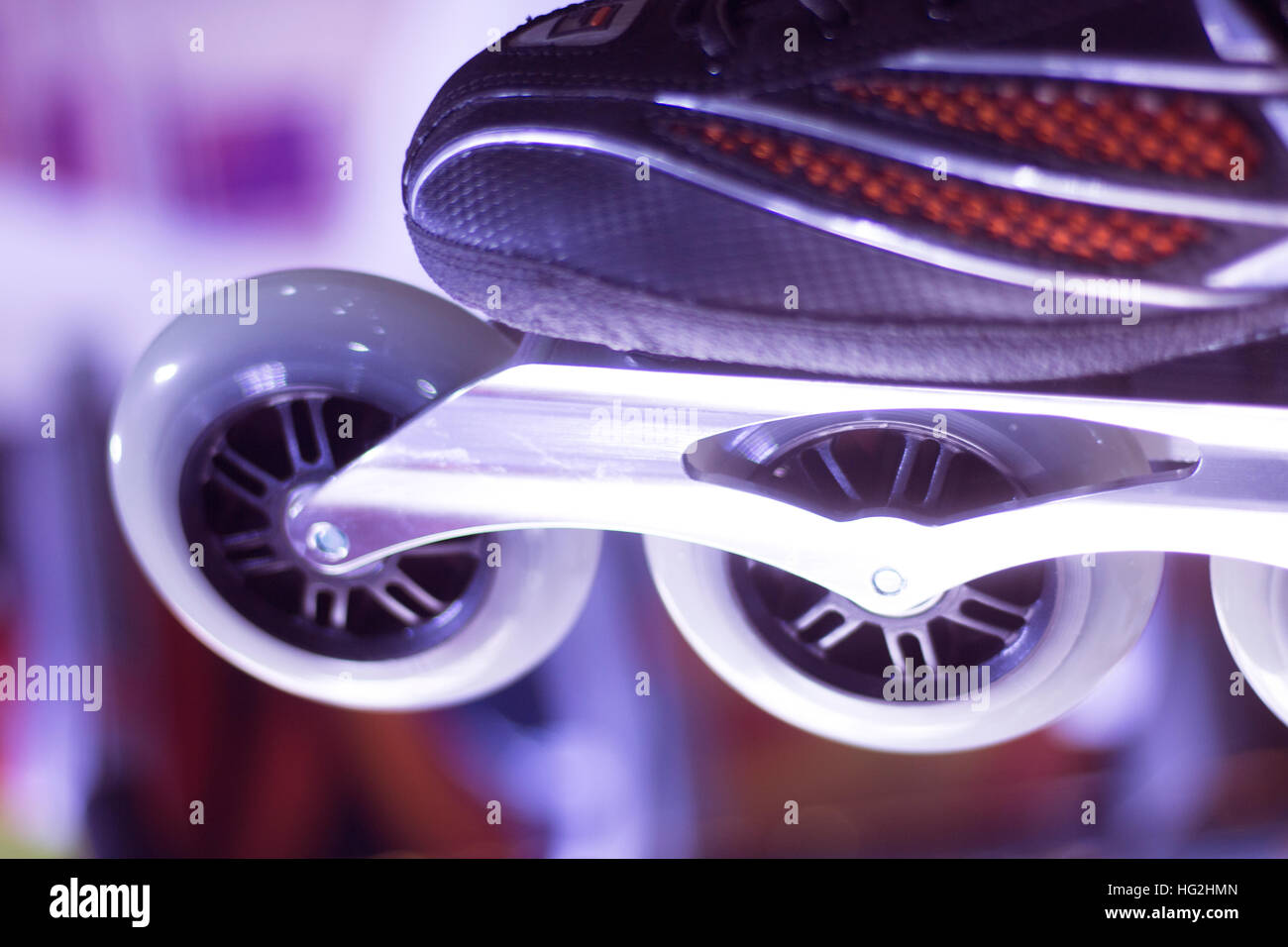 Freestyle inline skates boots and wheels in retail store shop window ...