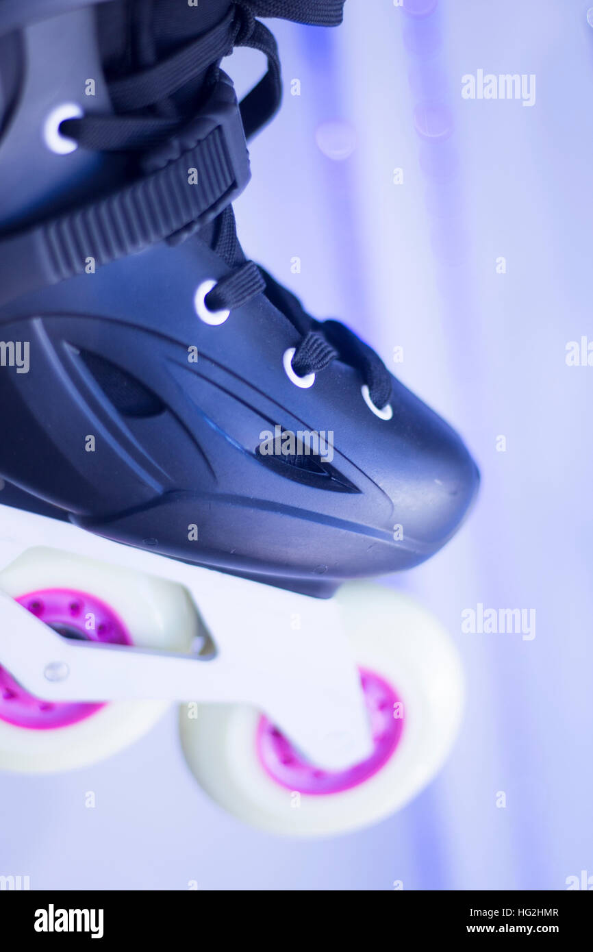 Freestyle inline skates boots and wheels in retail store shop window ...