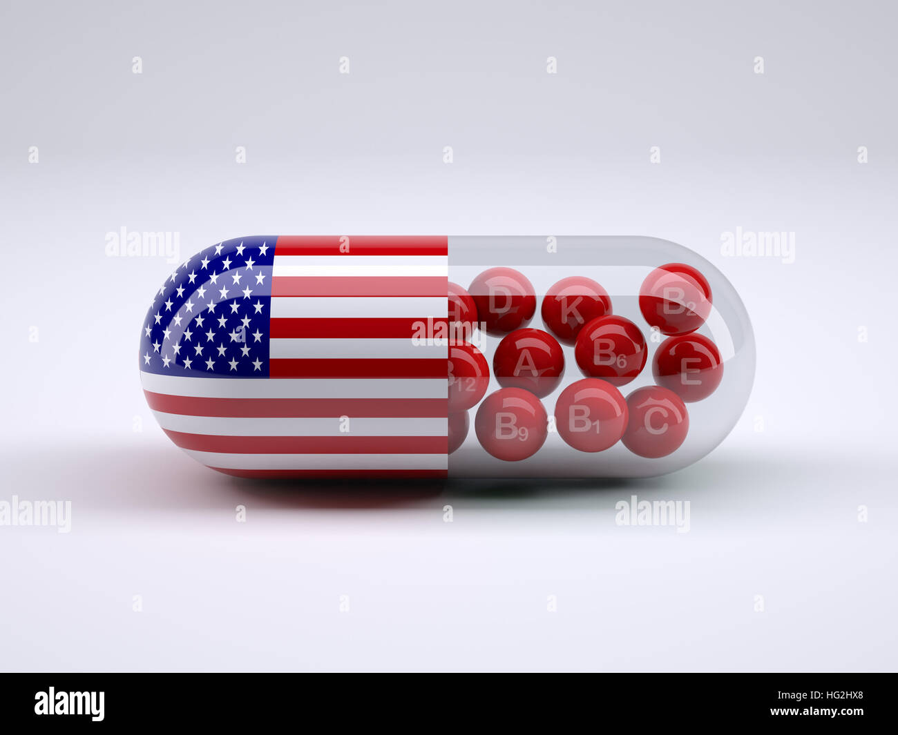 Pill with American flag wrapped around it and red ball vitamins inside ...
