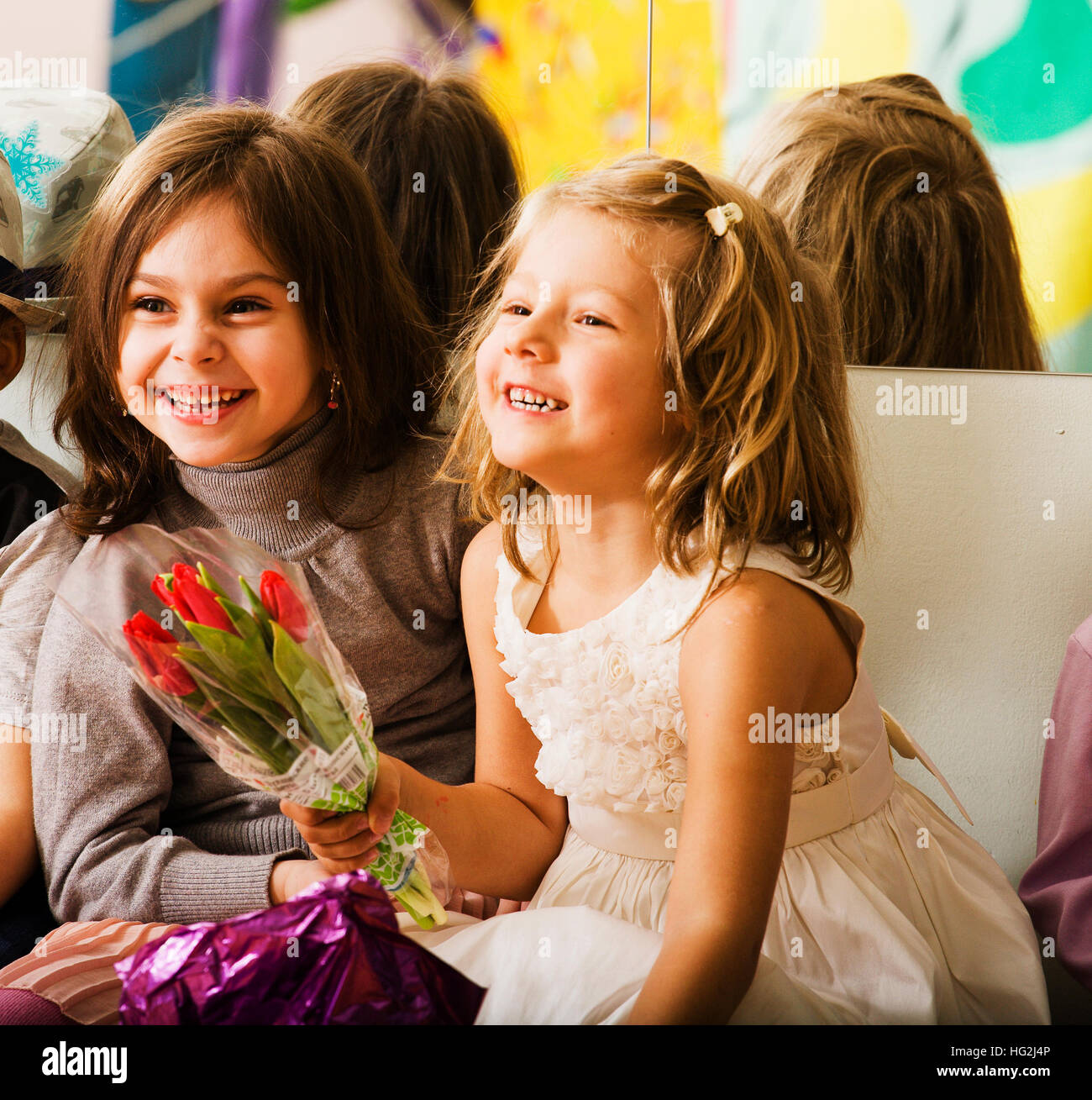 three little diverse girls at birthday party having fun Stock Photo - Alamy