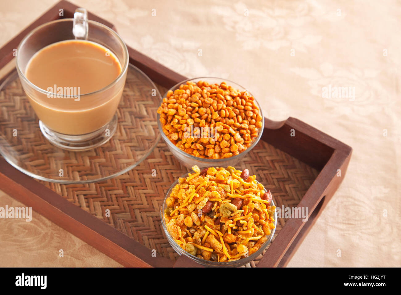 Bowls of snacks and tea Stock Photo - Alamy