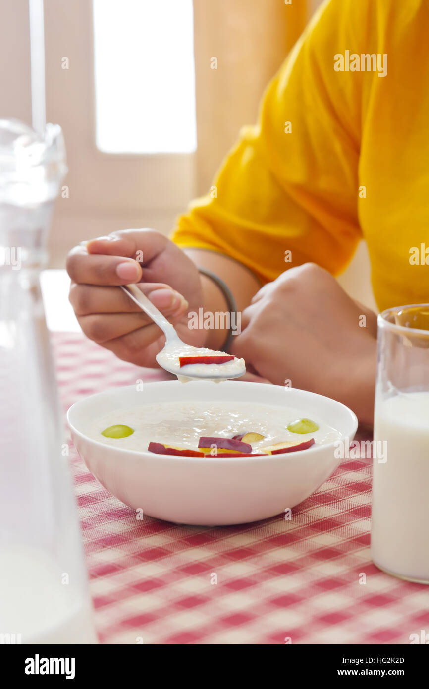 Woman Eating Breakfast Stock Photo - Alamy