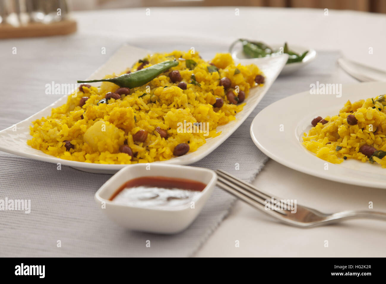 Indian breakfast poha Stock Photo - Alamy