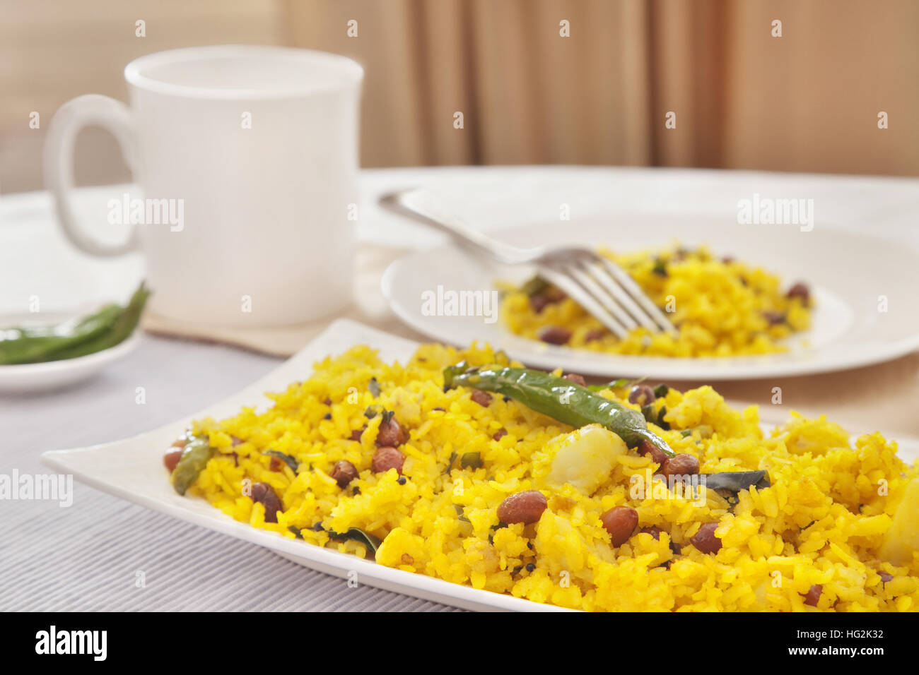 Indian breakfast poha Stock Photo - Alamy