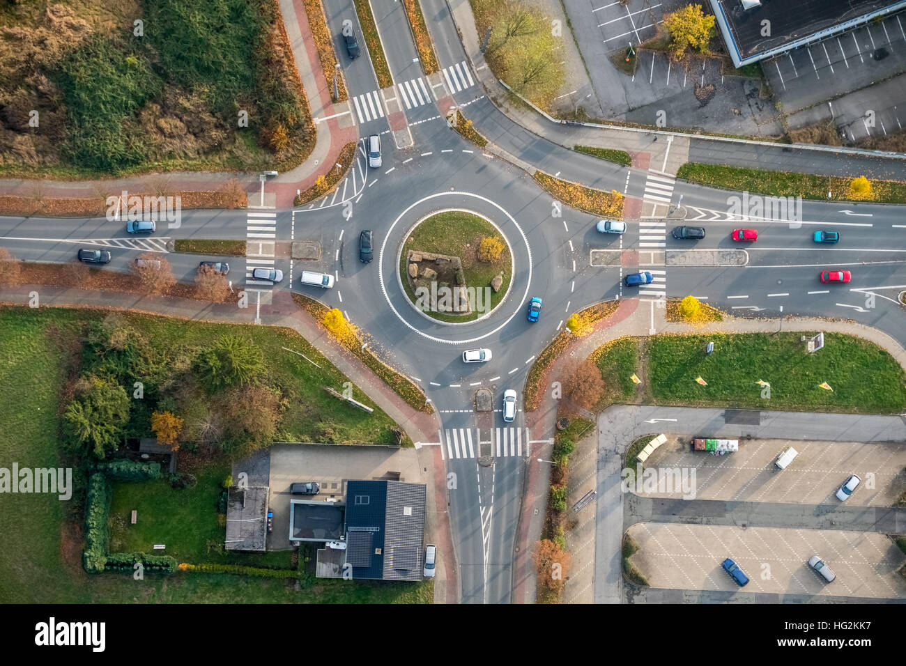 Aerial view, roundabout with autumn leaves, pedestrian crossings ...