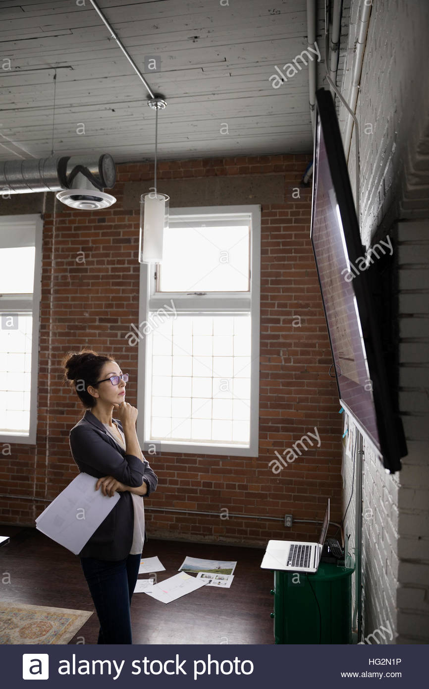 Watching tv television monitor hi-res stock photography and images - Alamy