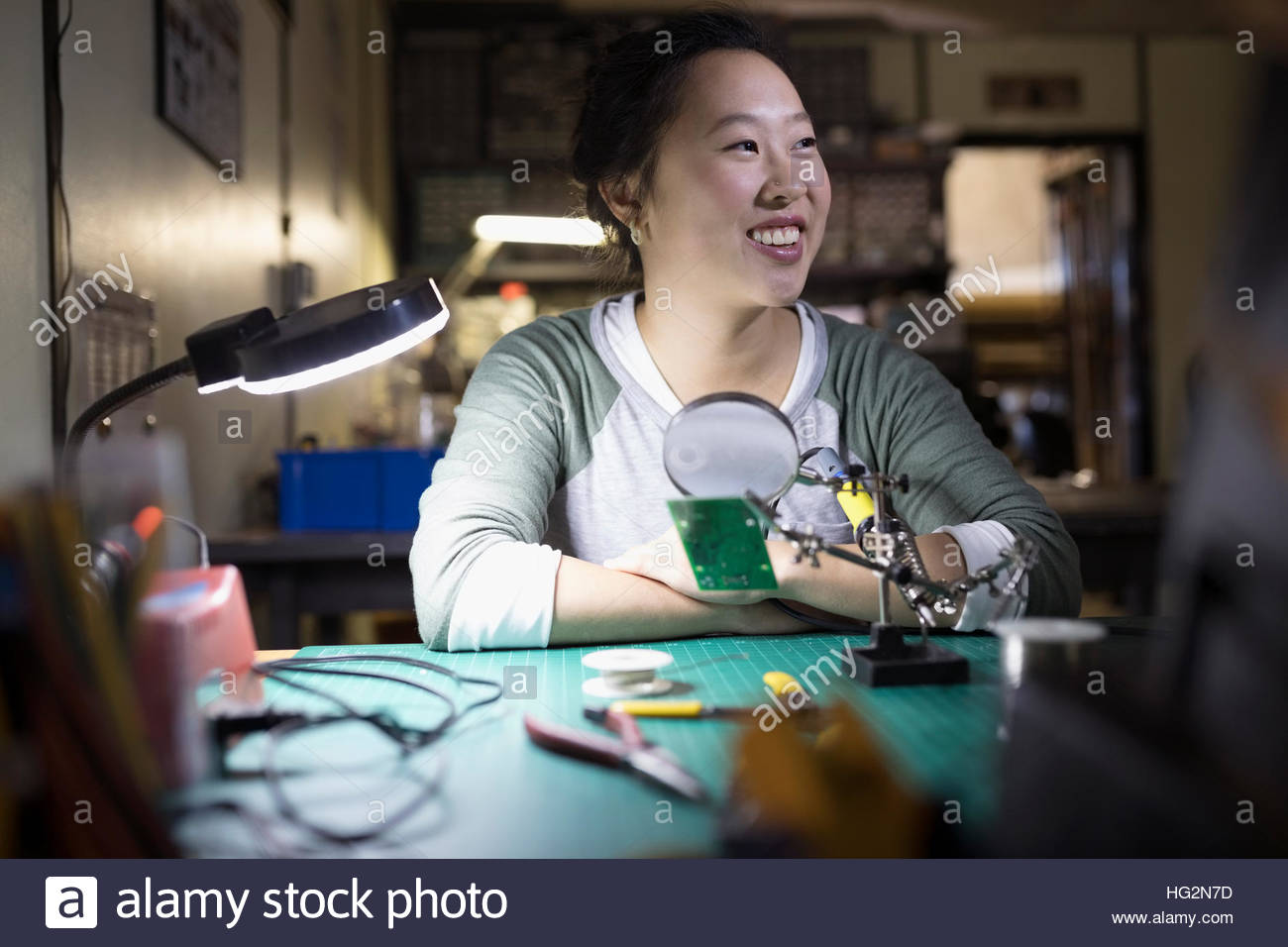 Repairing electronics woman hi-res stock photography and images - Alamy
