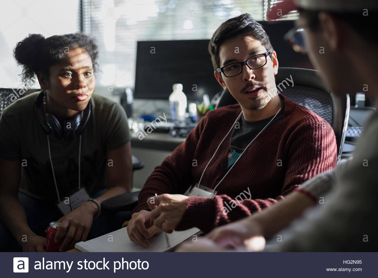 Hacker team brainstorming ideas at hackathon Stock Photo - Alamy