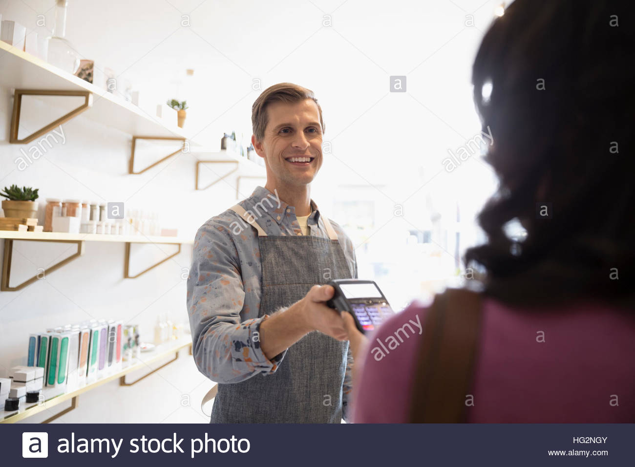 Man cashier convenience store hi-res stock photography and images - Alamy