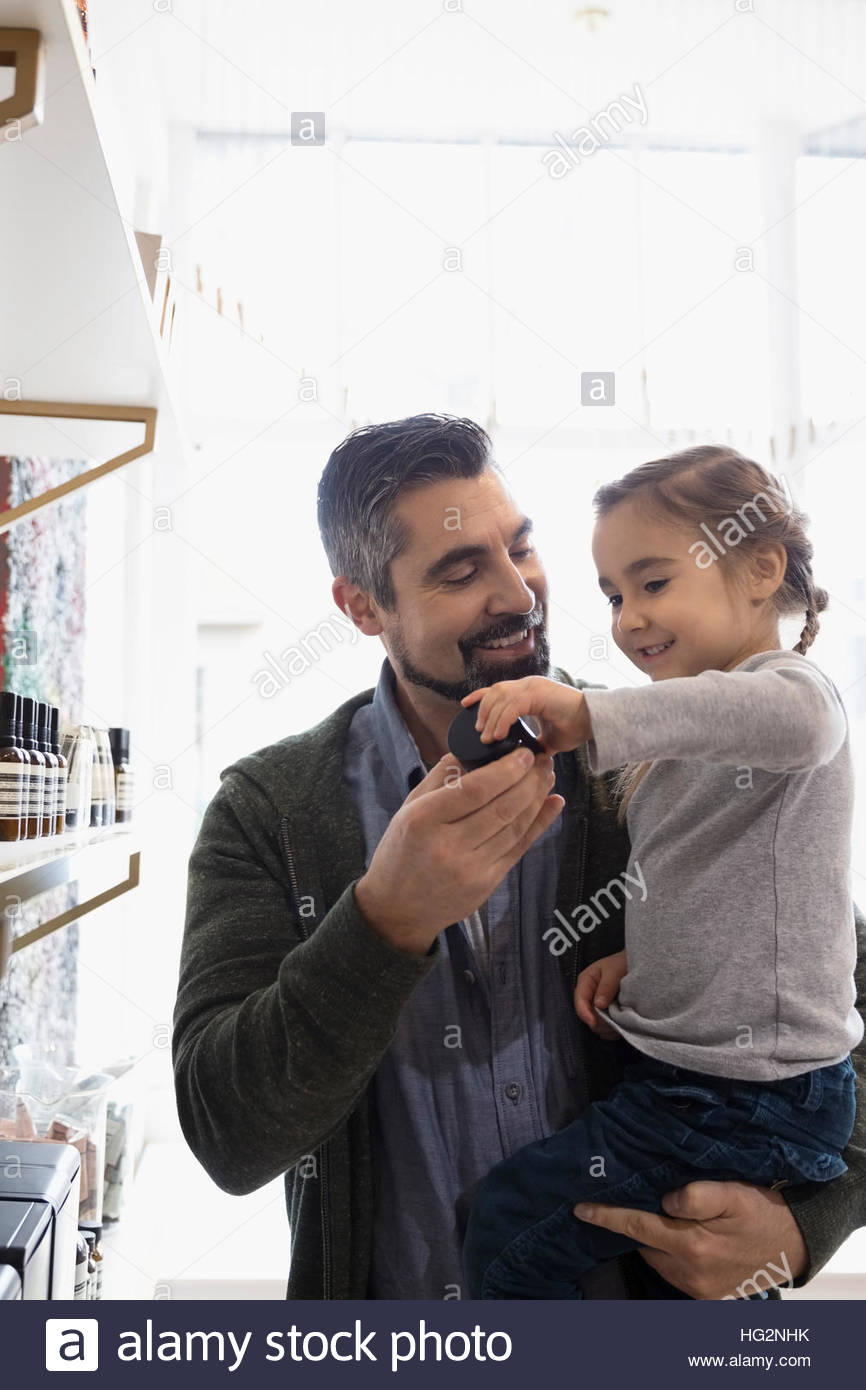 Child in shop talking hi-res stock photography and images - Alamy