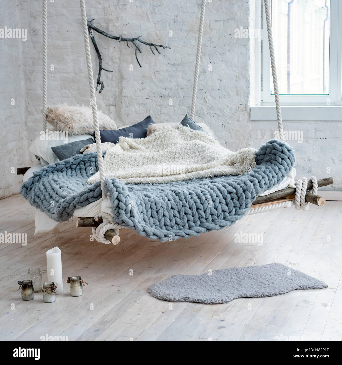 White loft interior in classic scandinavian style. Hanging bed ...