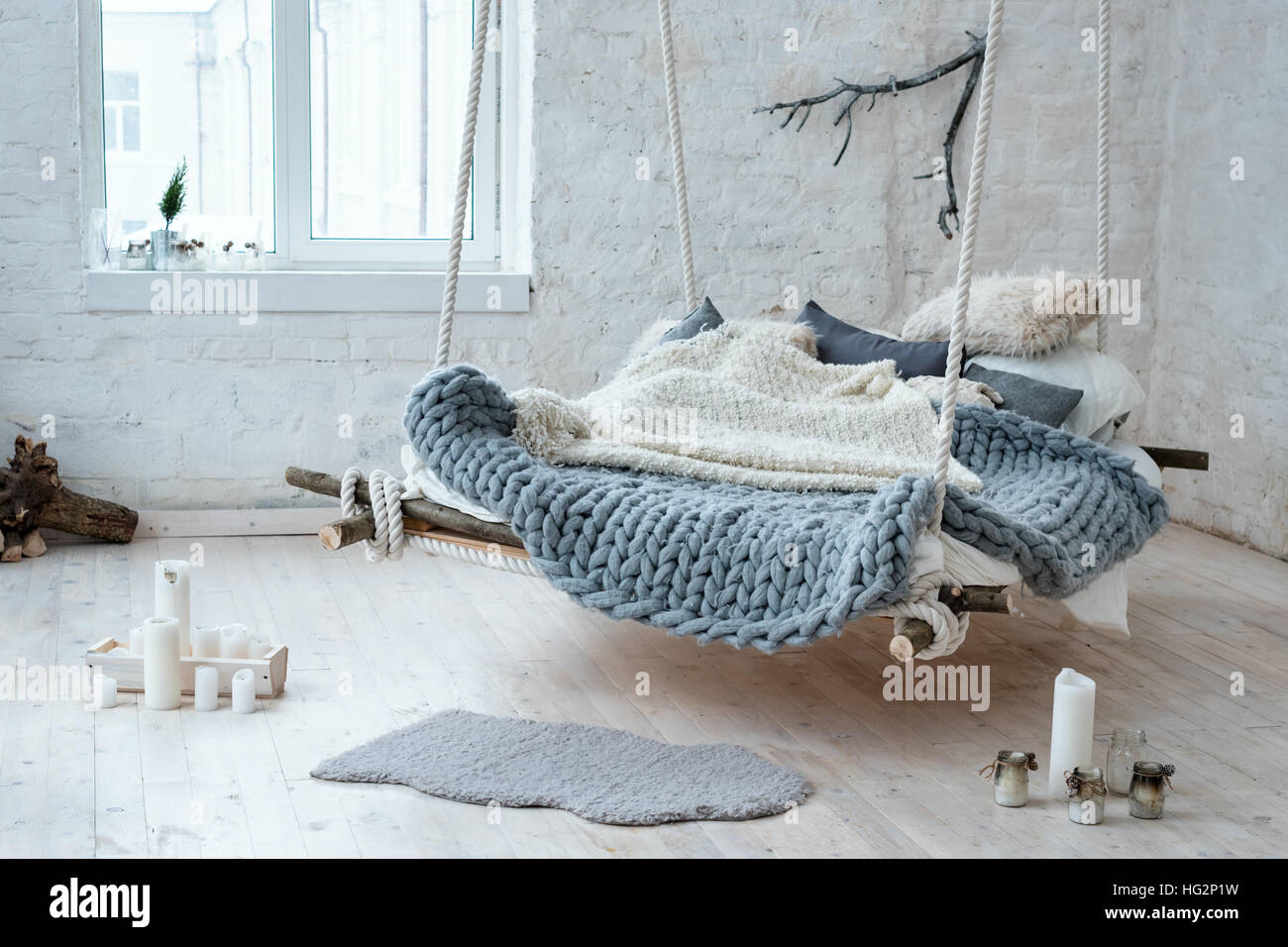 White loft interior in classic scandinavian style. Hanging bed ...