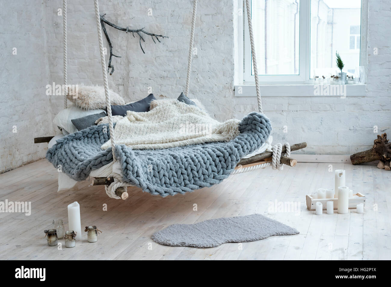 White loft interior in classic scandinavian style. Hanging bed ...
