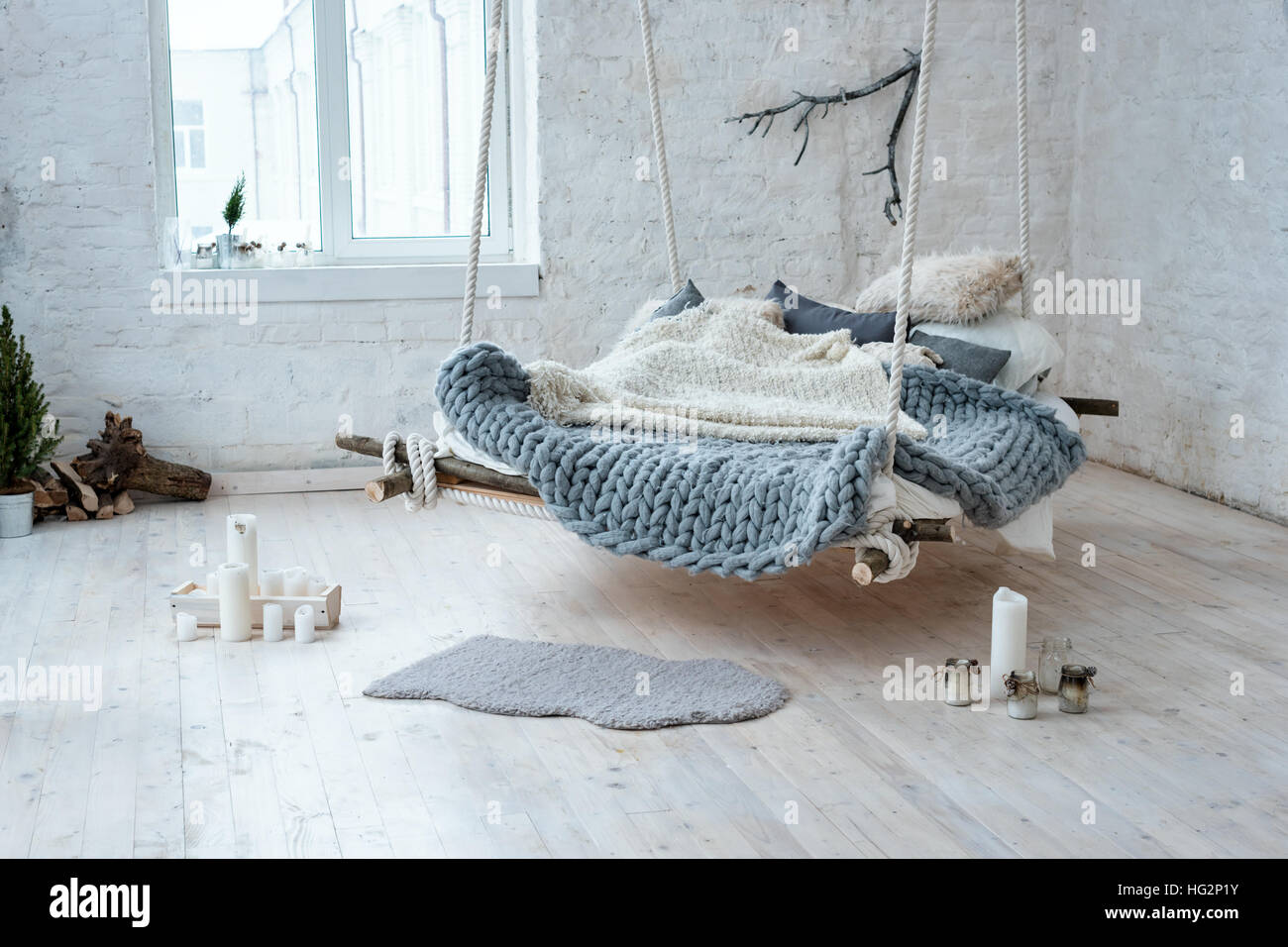 White loft interior in classic scandinavian style. Hanging bed ...