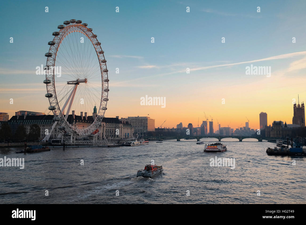 London Eye and London cityscape with a sunset glow Stock Photo - Alamy