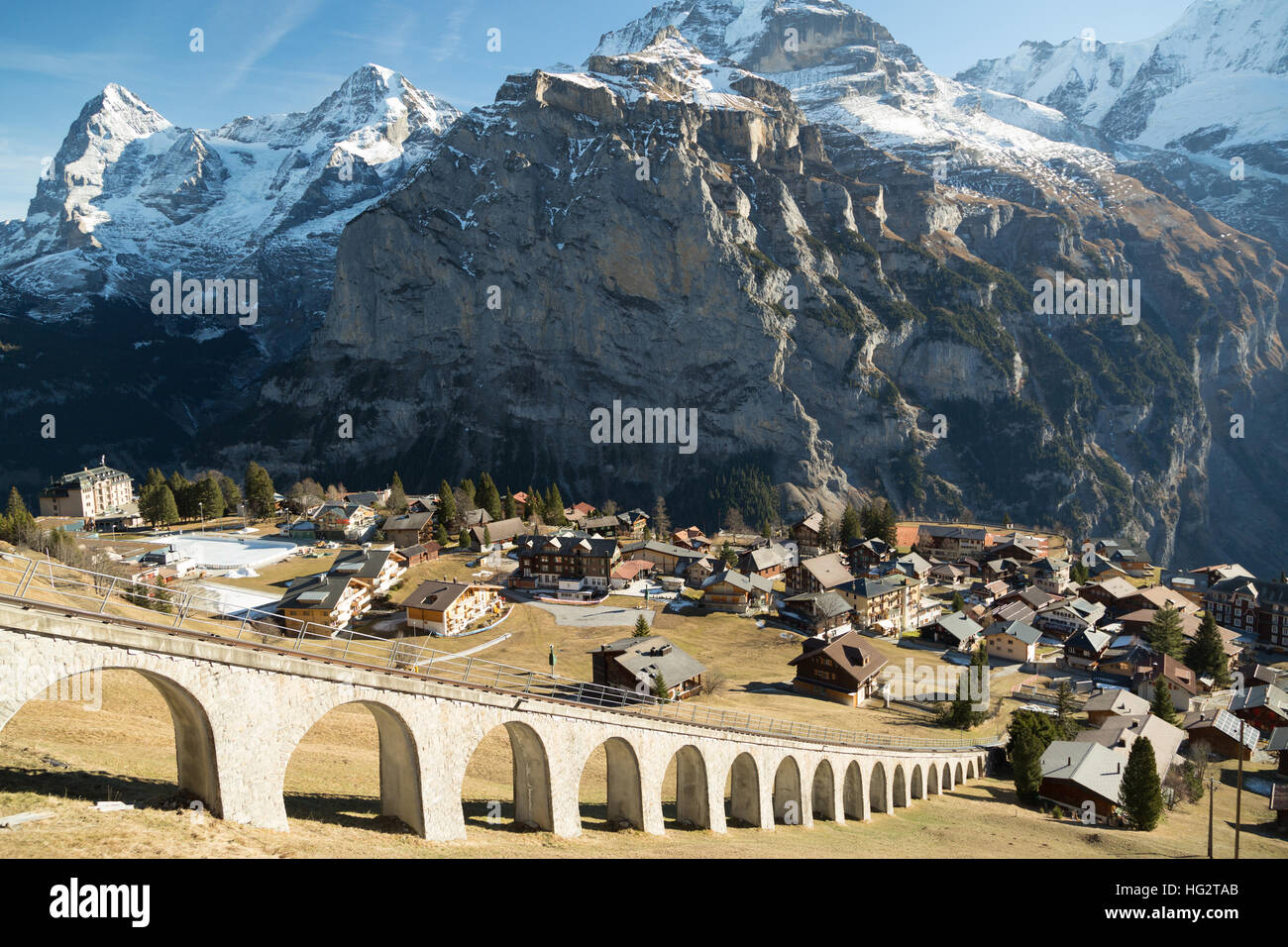 A photograph of a stone arched bridge for a funicular in Mürren on a ...