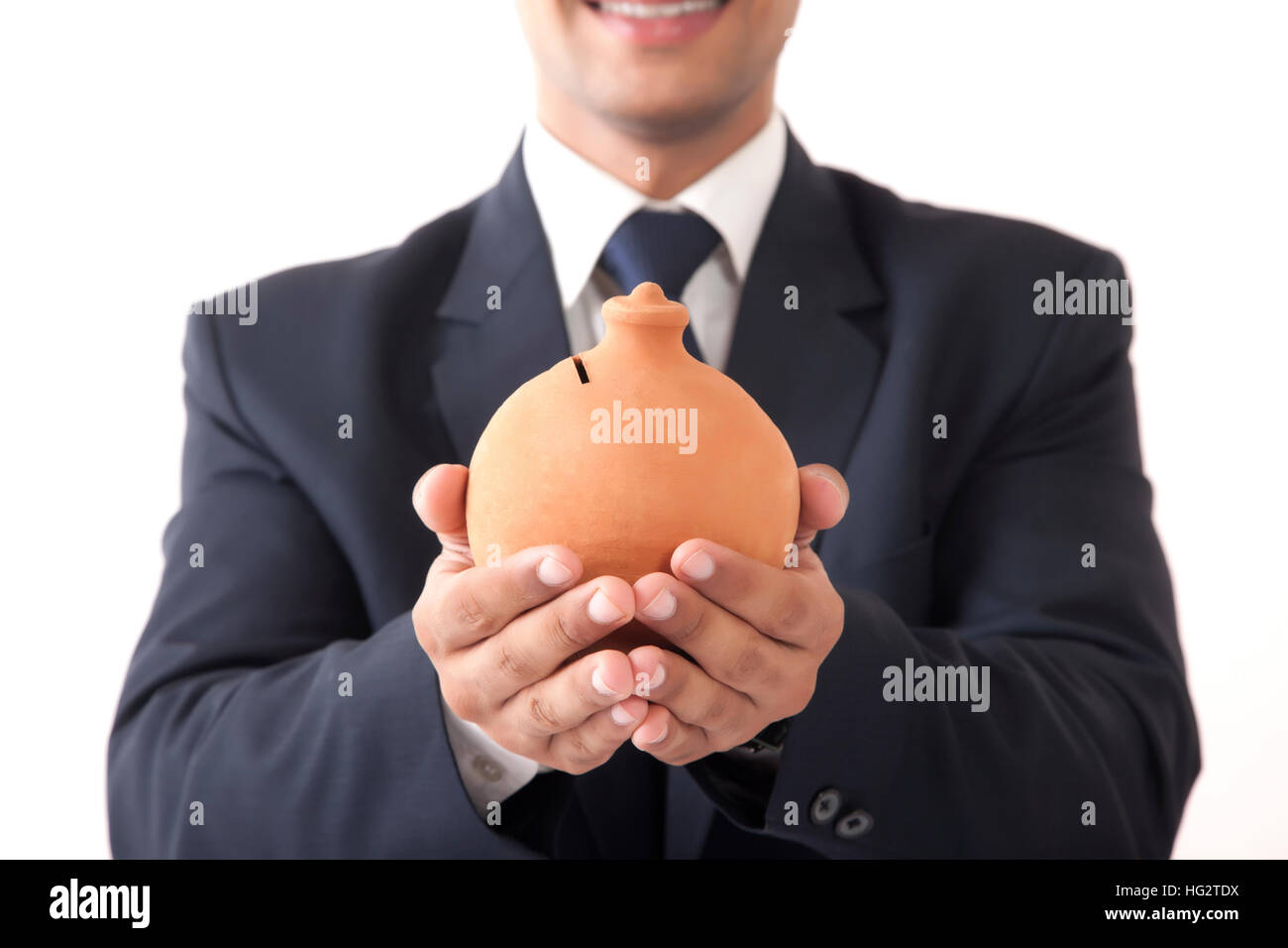 Young adult saving money hi-res stock photography and images - Alamy