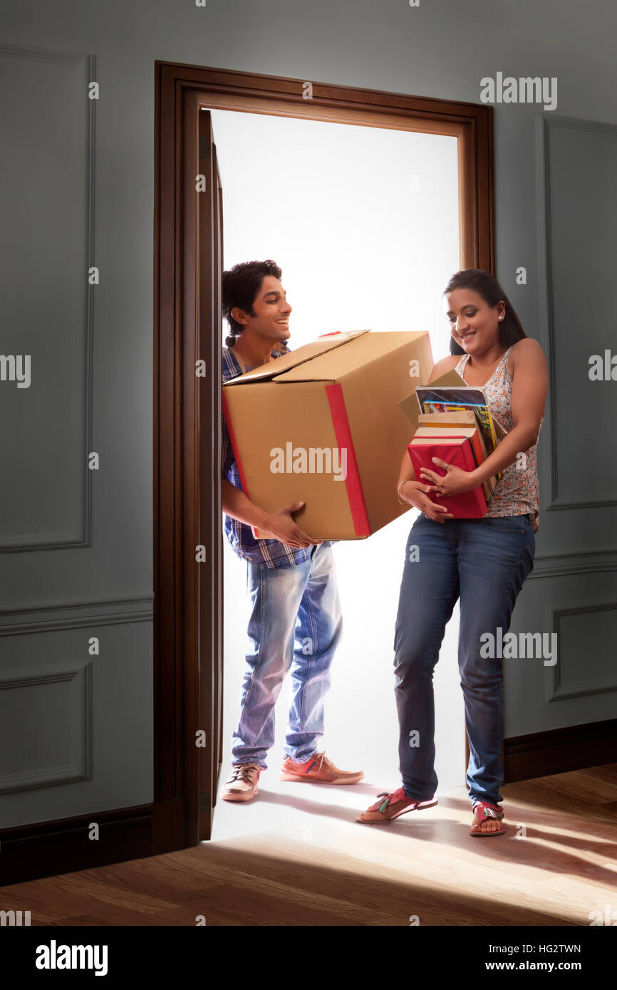 People Carrying Boxes