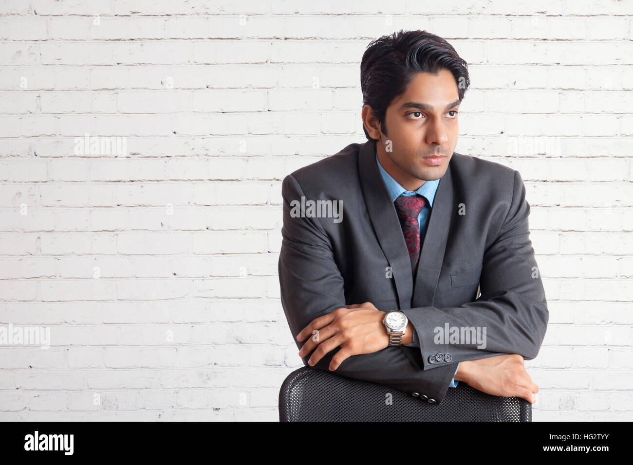 Leaning on chair hi-res stock photography and images - Alamy