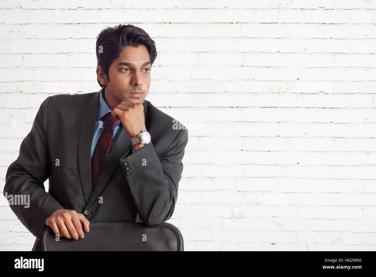 Leaning over chair hi-res stock photography and images - Alamy