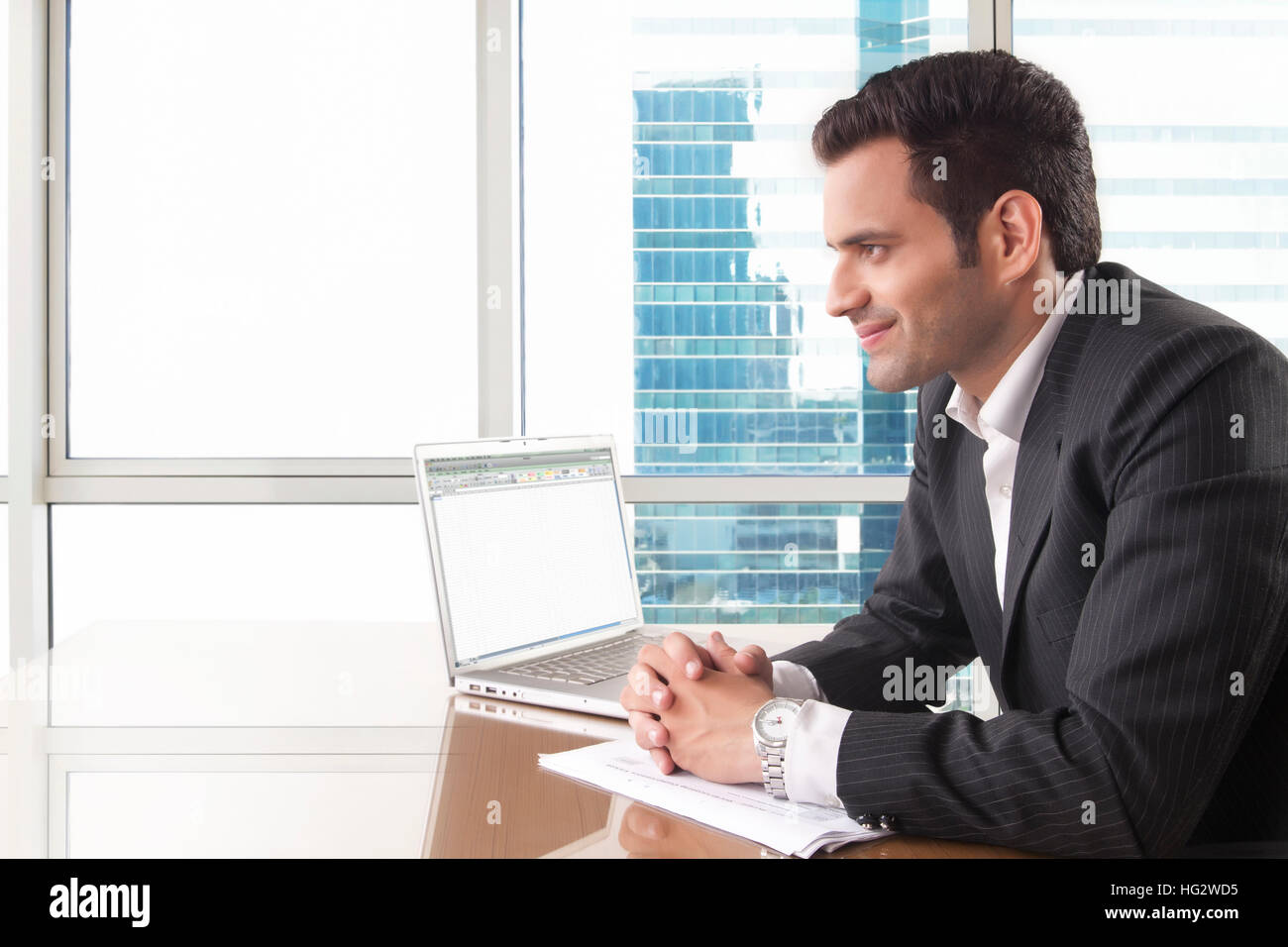 Young business man working in the office Stock Photo - Alamy
