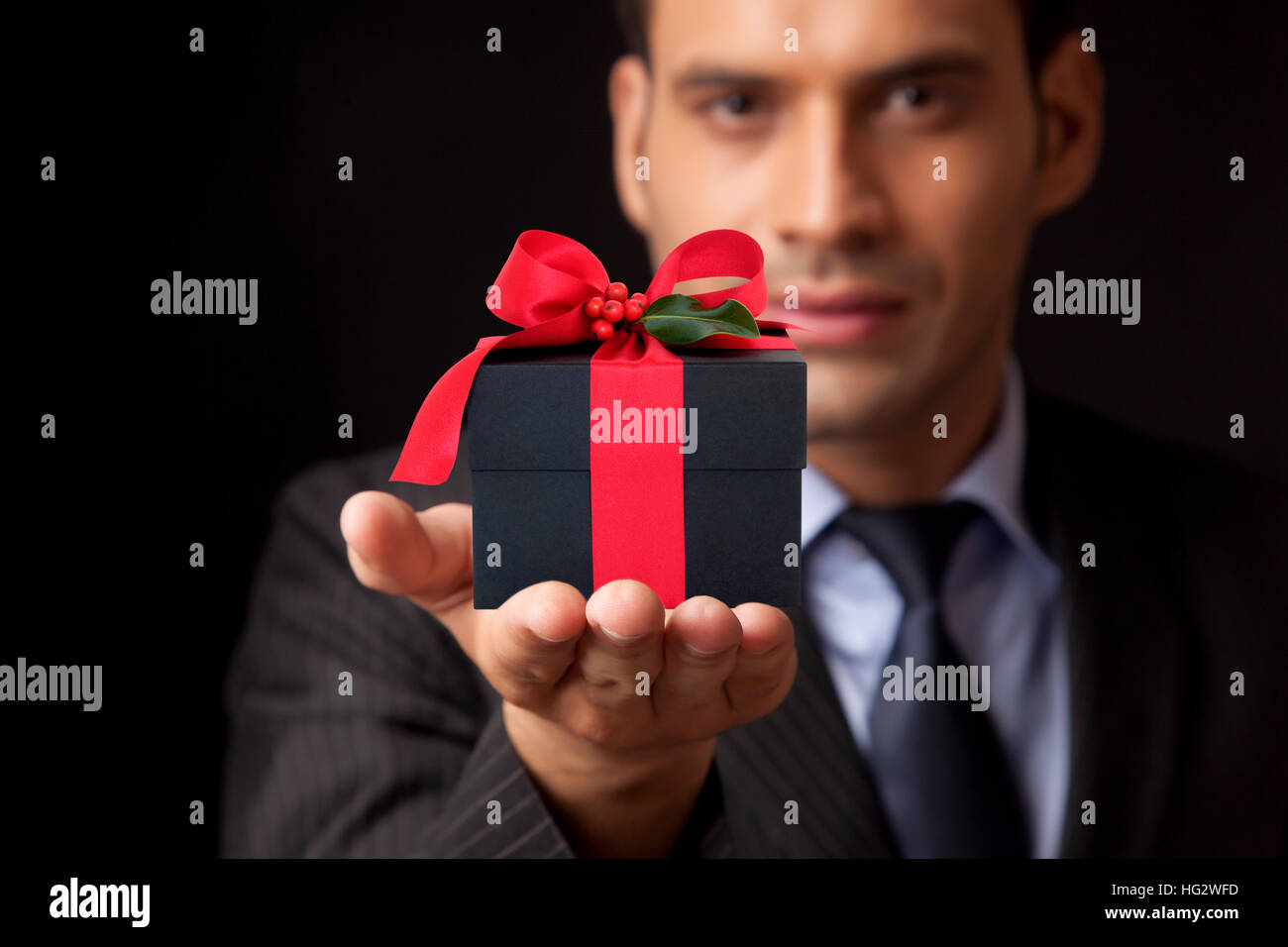 Man give gift box hi-res stock photography and images - Alamy