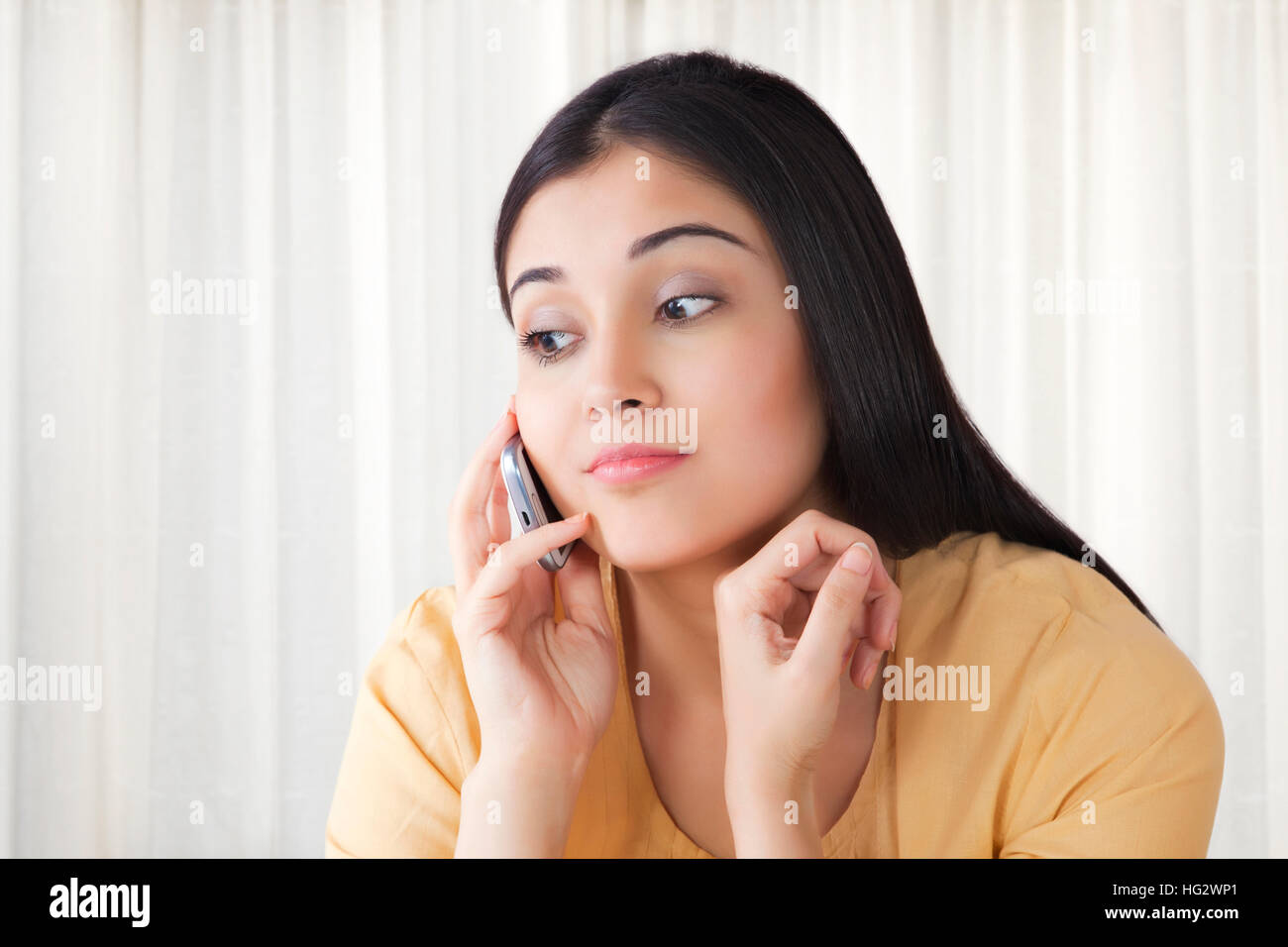 People talking on phone india hi-res stock photography and images - Alamy