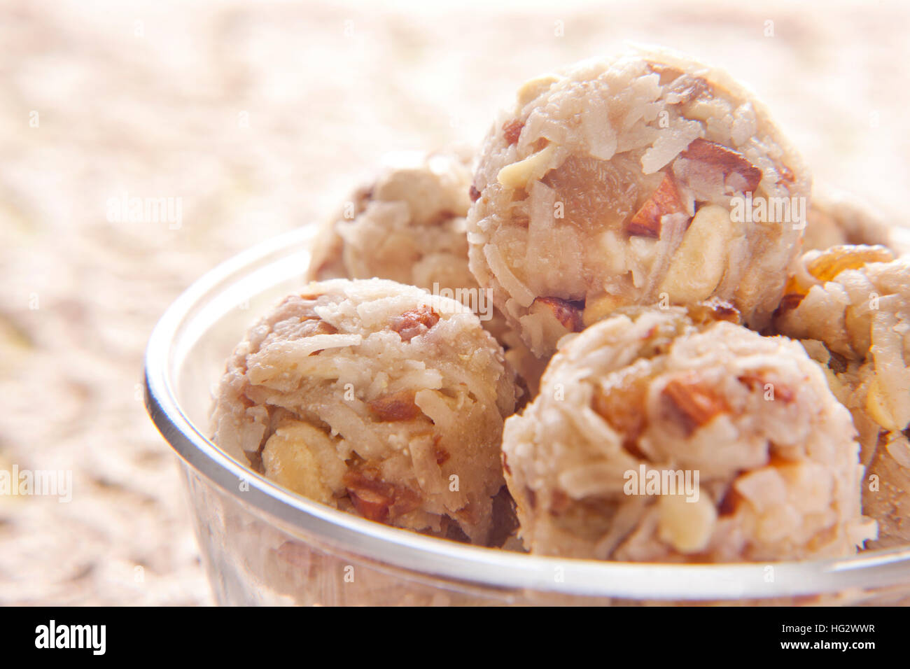 Close up of ladoos in a glass bowl , indian sweet Stock Photo - Alamy
