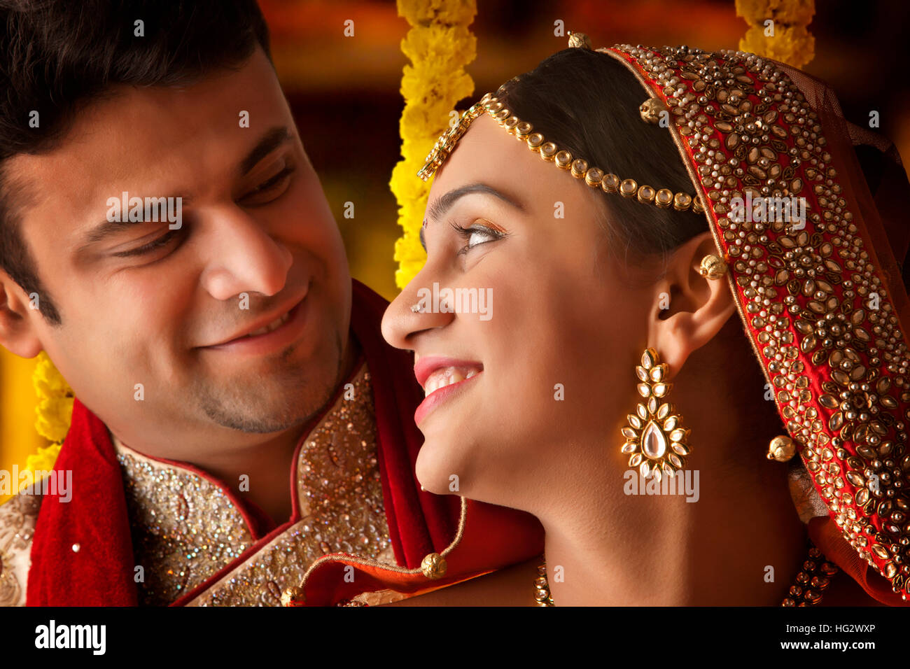 Handsome groom looking at beautiful bride , , young couple Stock Photo ...