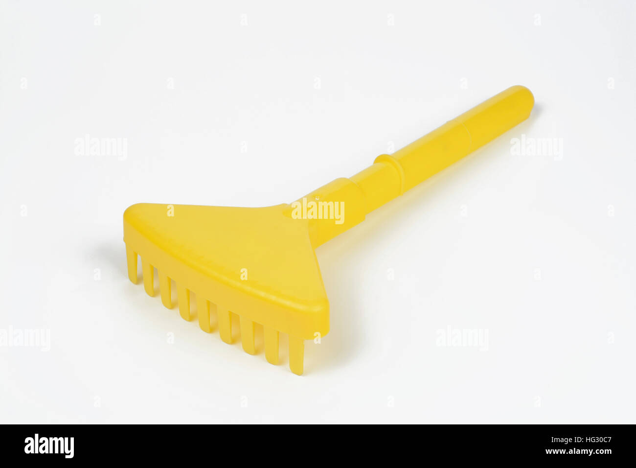 Yellow Rake High Resolution Stock Photography and Images - Alamy