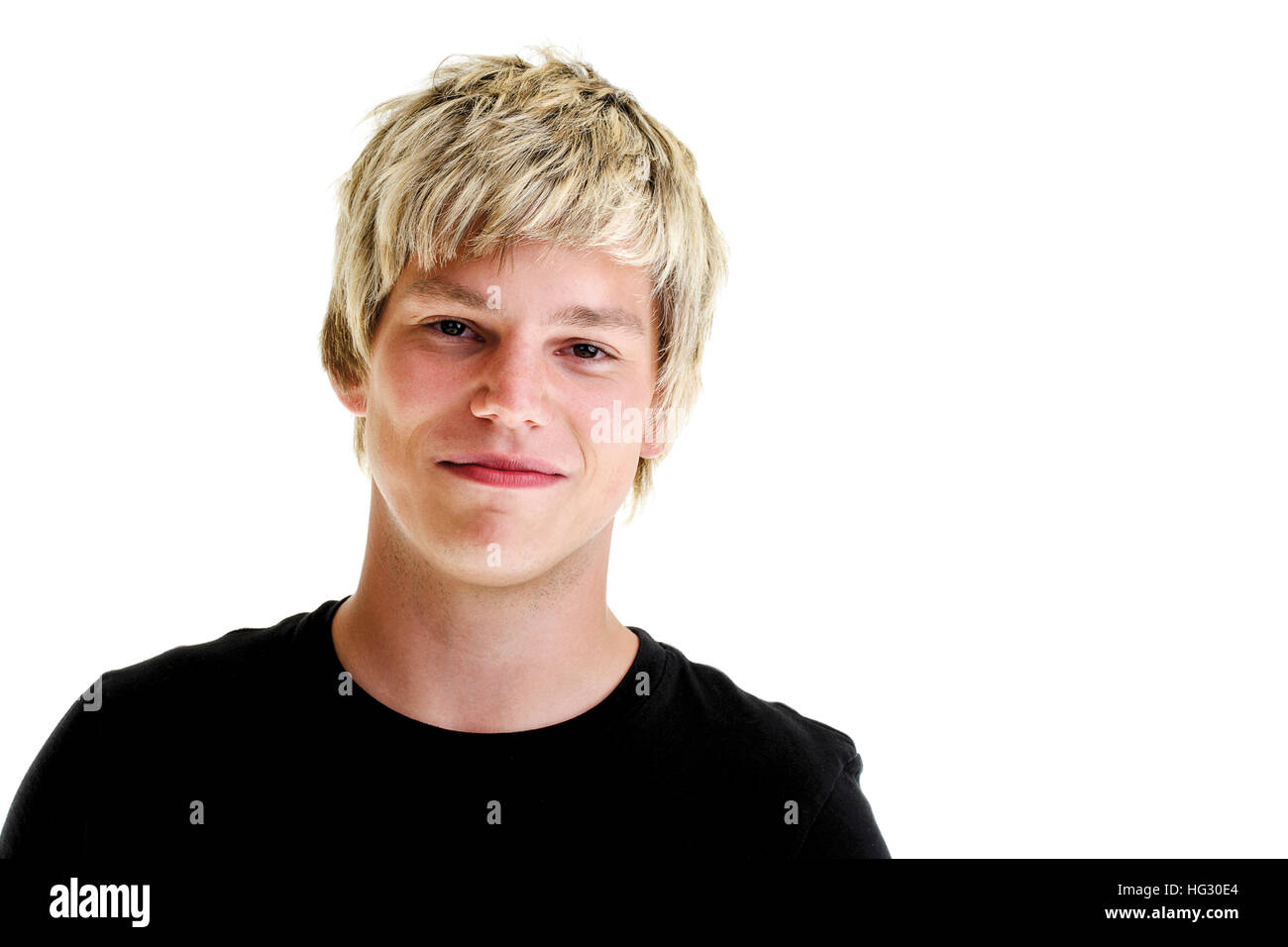 Young man looking into camera Stock Photo - Alamy