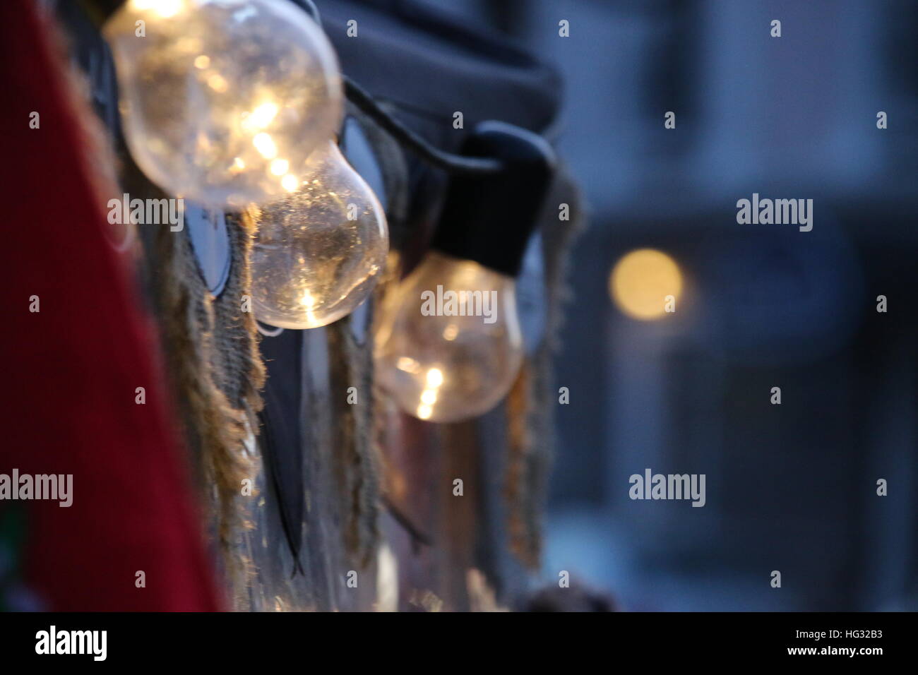 Retro antique hanging light bulbs. Holidays background. Blurred photos ...