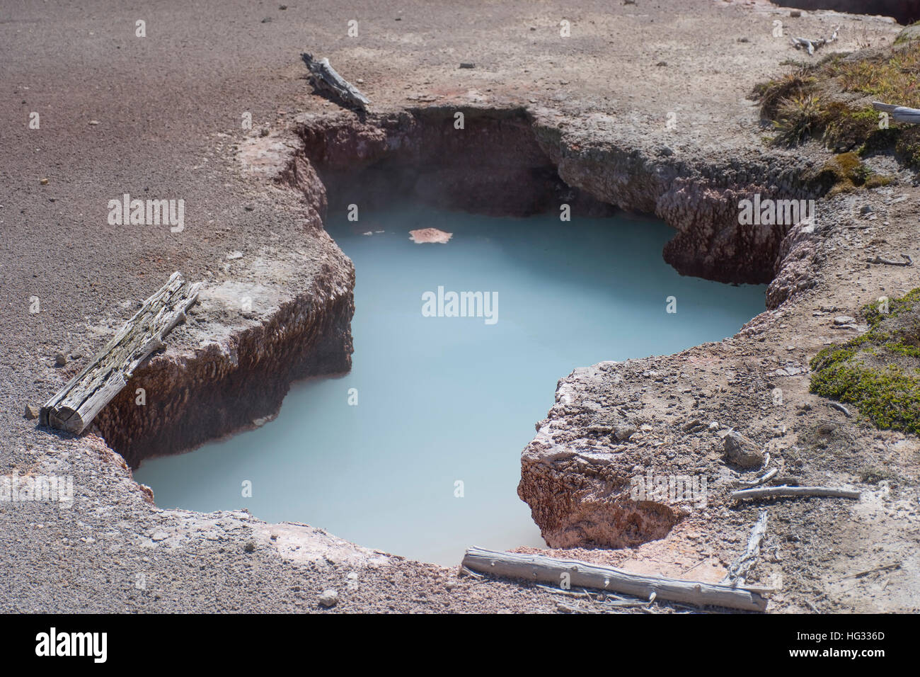 A small turquoise pool in the Mud Volcano area in Yellowstone National ...