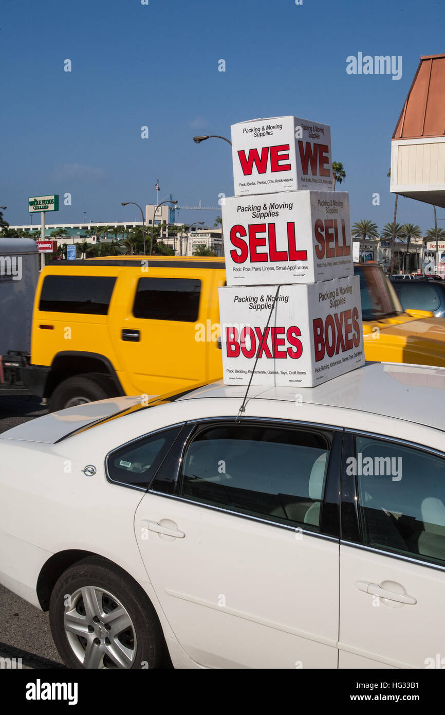 Boxes, for, sale, advertised, from, roof of car in Los Angeles ...