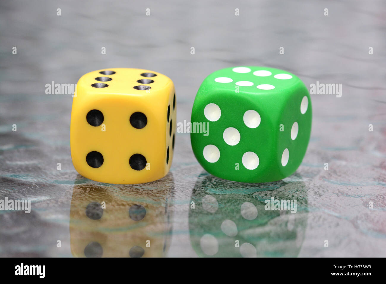 Pair of colorful dice Stock Photo - Alamy