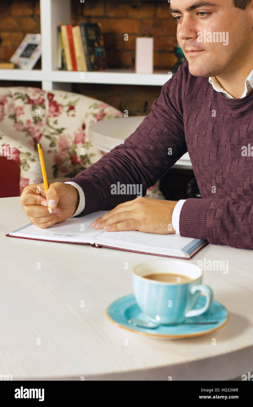Man with pencil hi-res stock photography and images - Alamy