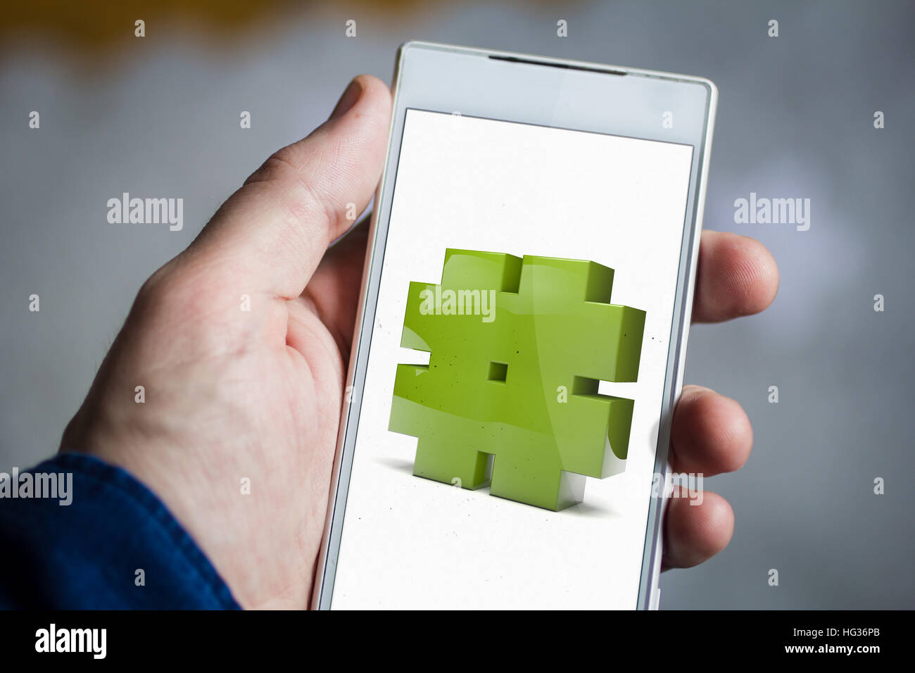 man hand holding hash sign smartphone. All screen graphics are made up ...
