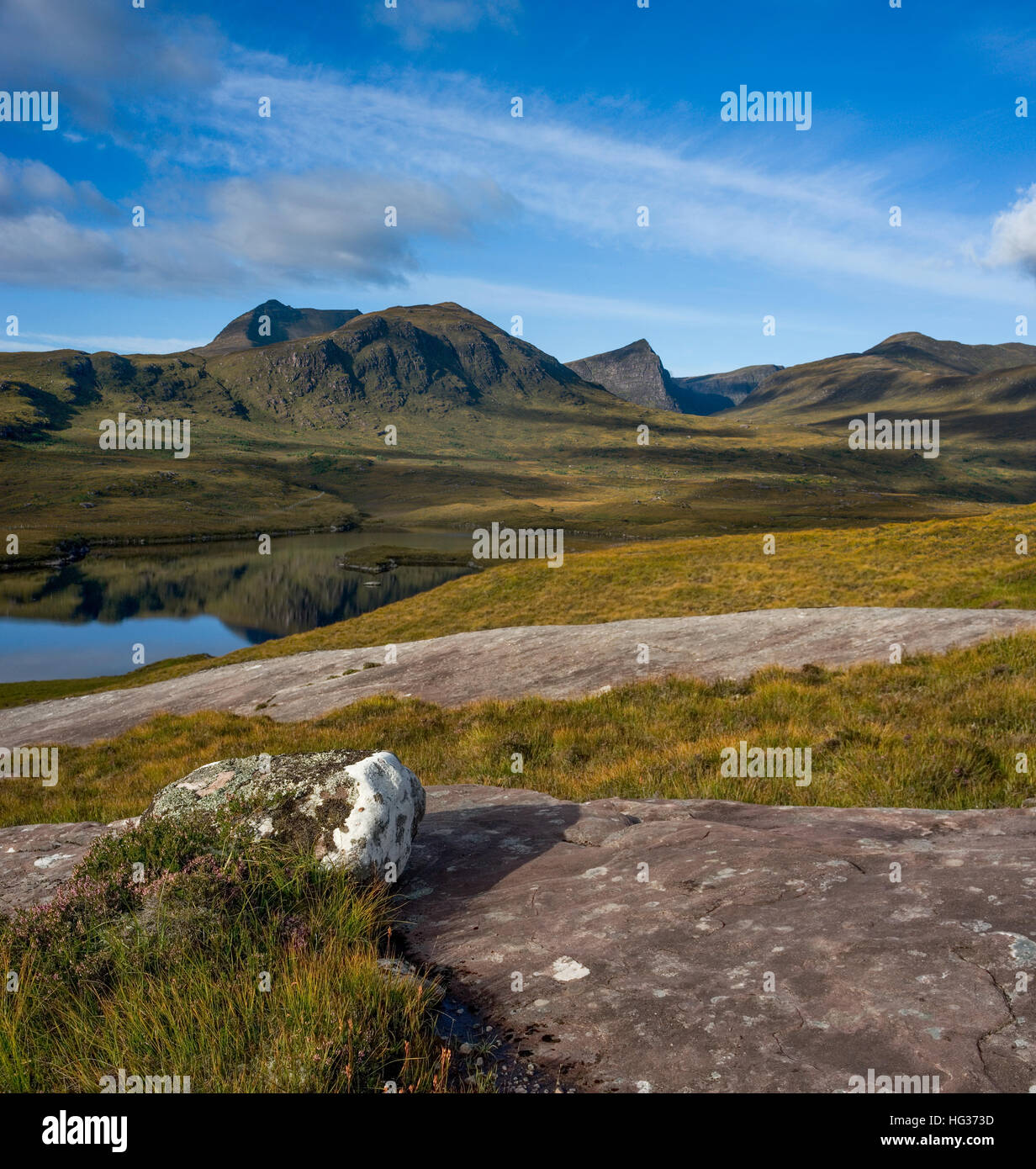 Looking across Lochanan Dubha towards Ben More Coigach in Scotland ...
