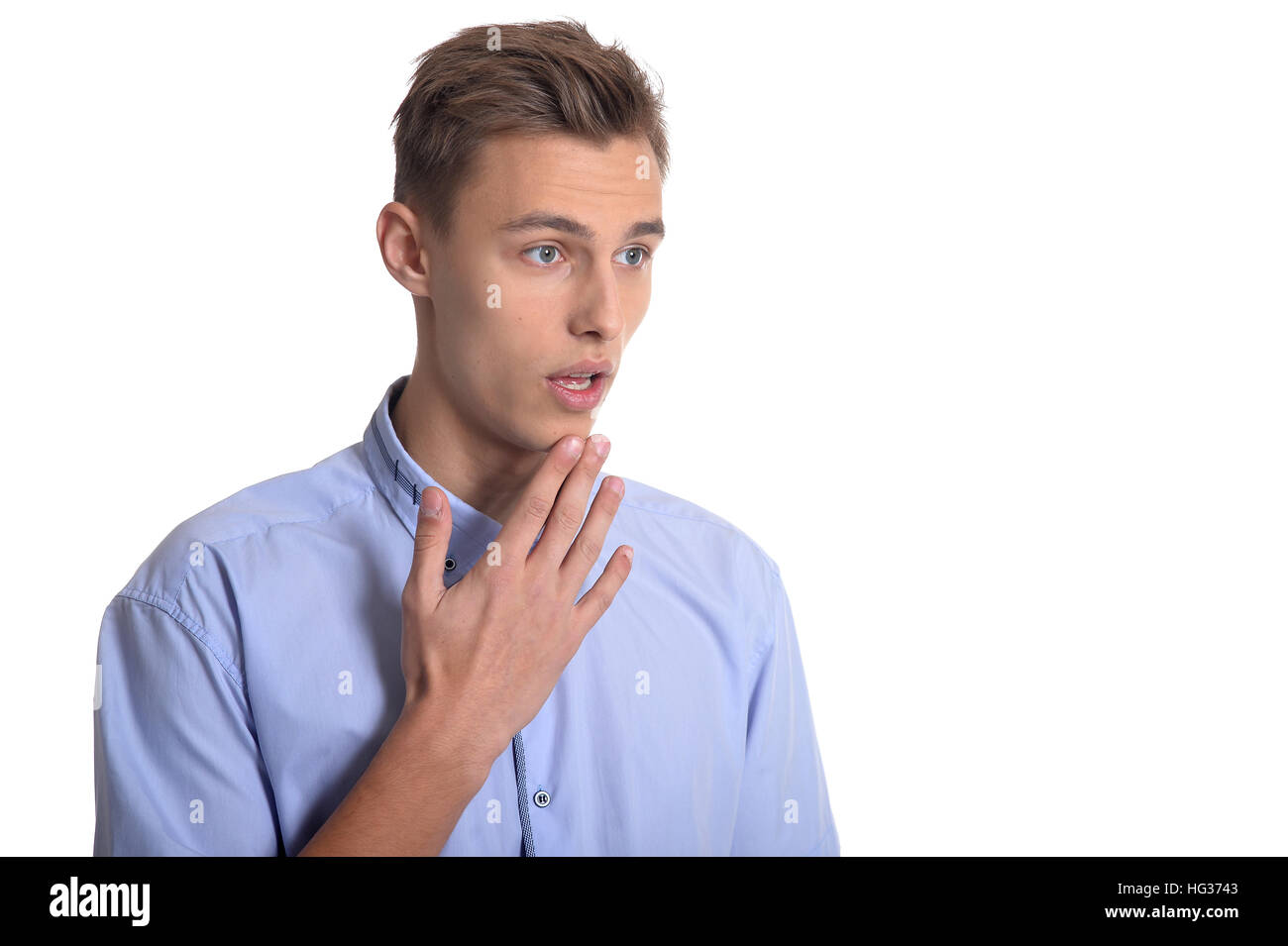 Surprised young man Stock Photo - Alamy