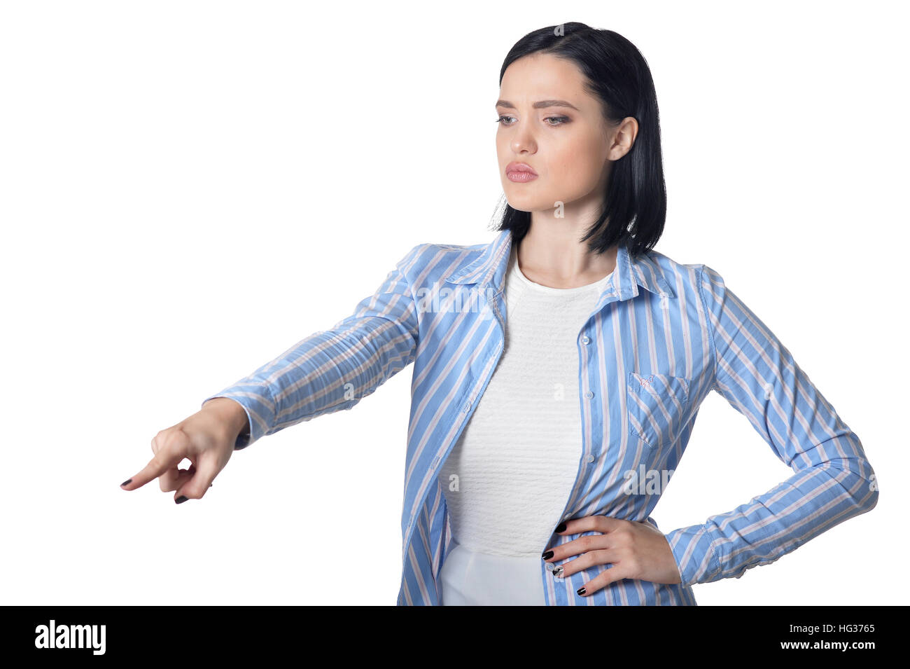 Young woman pointing Stock Photo - Alamy